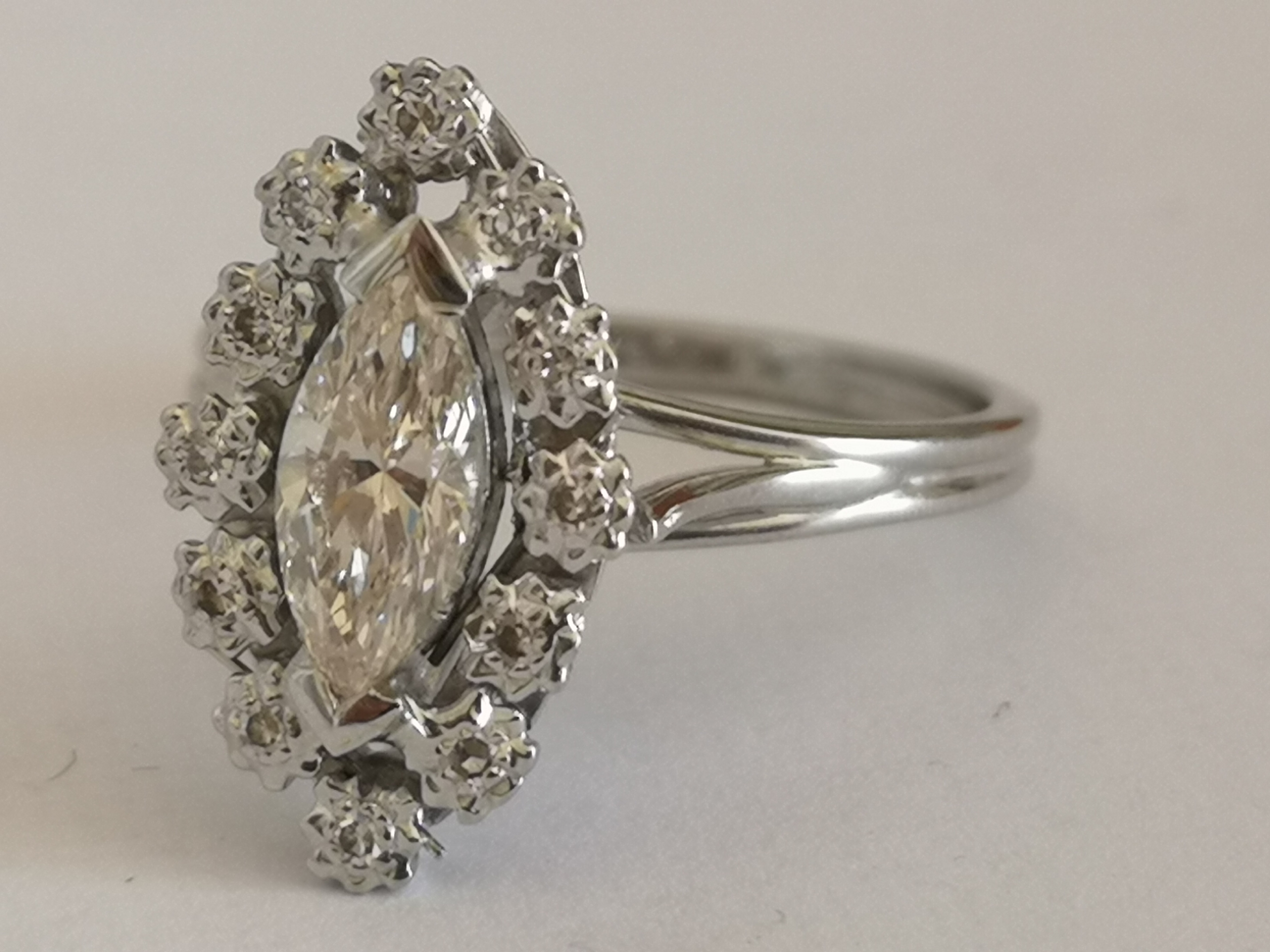 Ring in grey gold navette-cut diamonds 0.7 cts flanked by diamonds ...