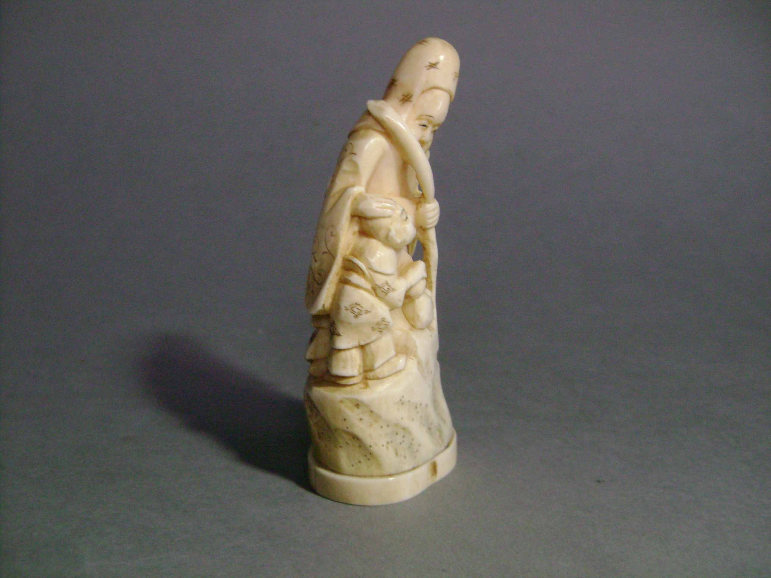 Japan - Ivory okimono representing Jurojin and child, early 20th ...